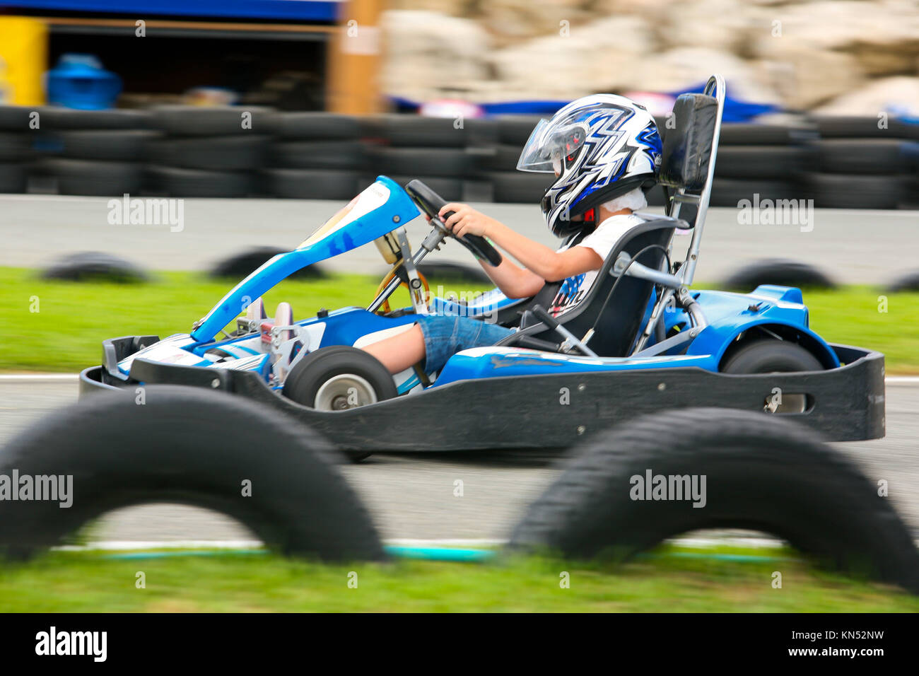 Unrecognizable people having fun on a go cart. Summer season Stock ...
