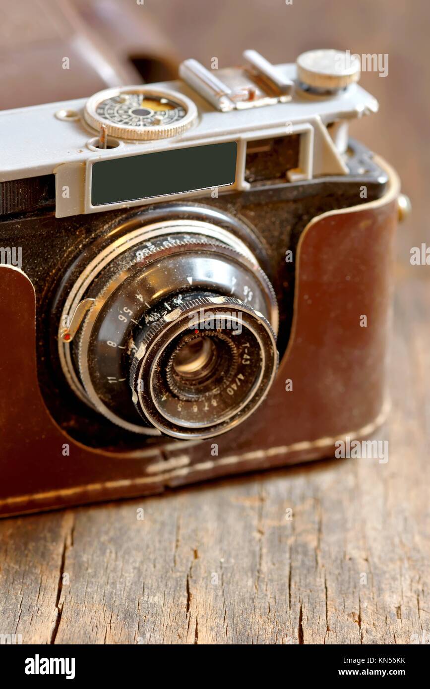 Old picture frame on vintage wood wall Stock Photo - Alamy