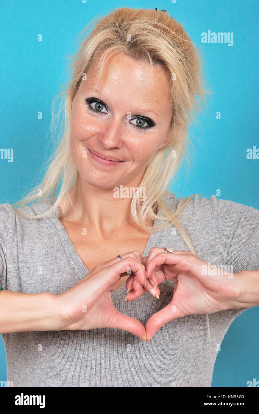 Hand heart shape hi-res stock photography and images - Alamy