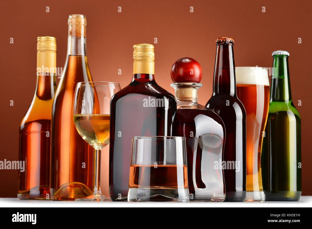 Bottles and glasses of assorted alcoholic beverages Stock Photo - Alamy