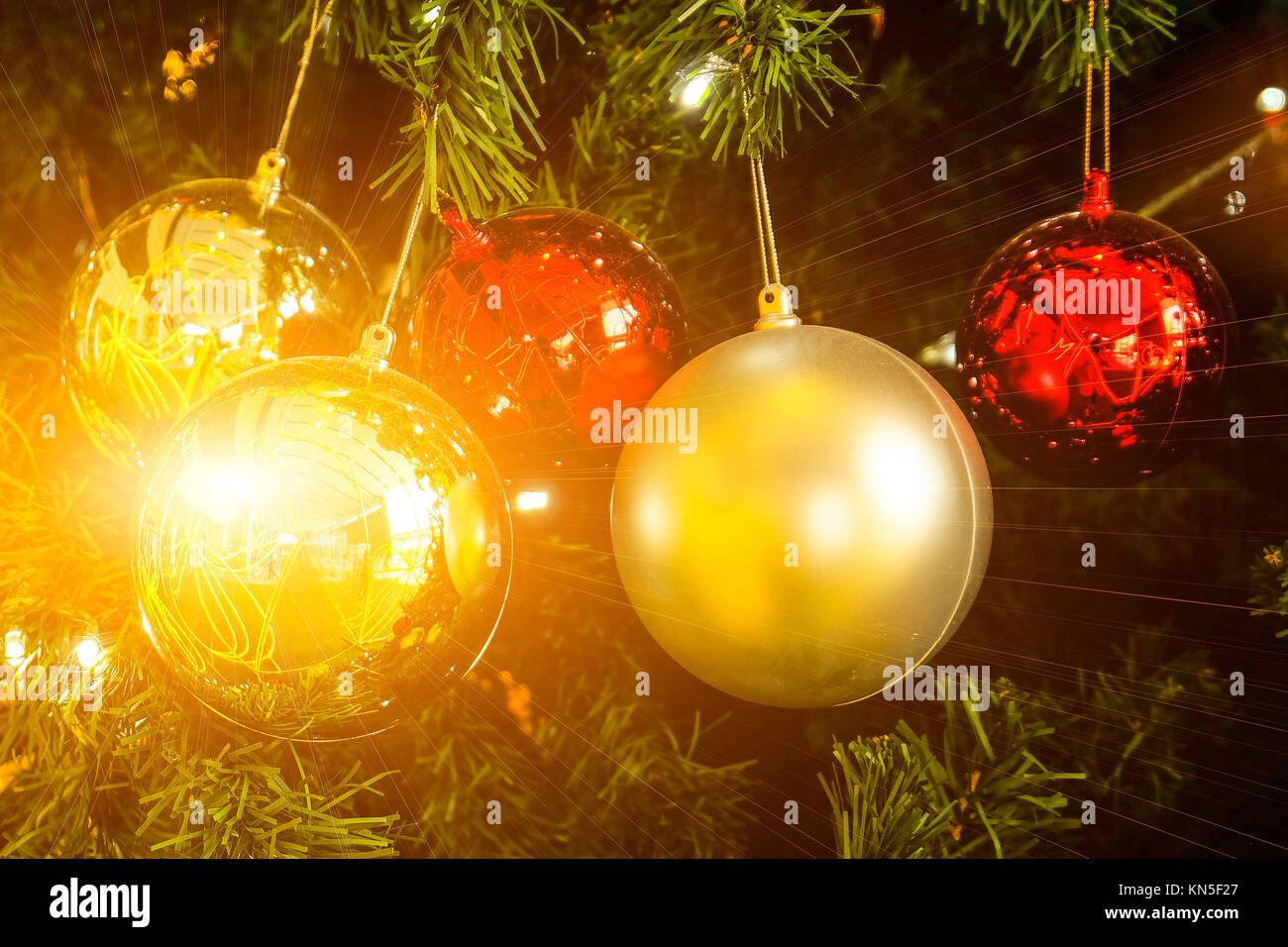 decorated christmas fir tree with flares Stock Photo - Alamy