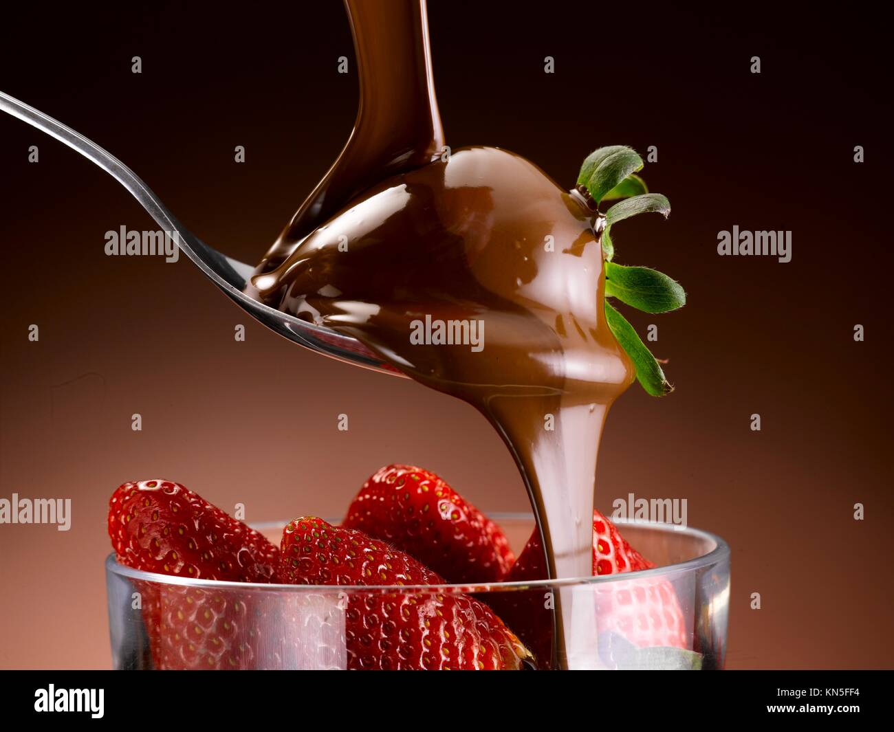 beautiful strawberries wrapped in chocolate Stock Photo - Alamy