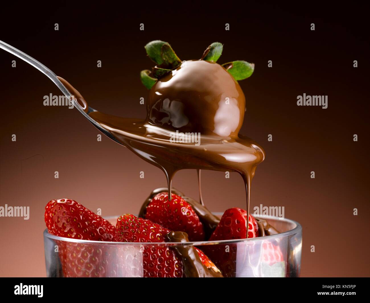beautiful strawberries wrapped in chocolate Stock Photo - Alamy