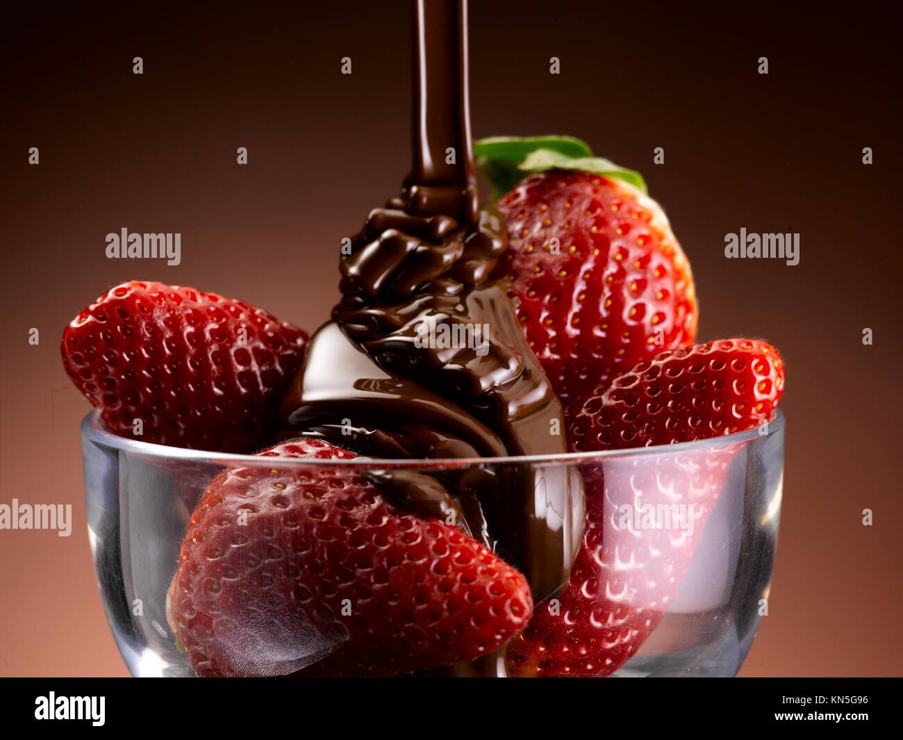 beautiful strawberries wrapped in chocolate Stock Photo - Alamy