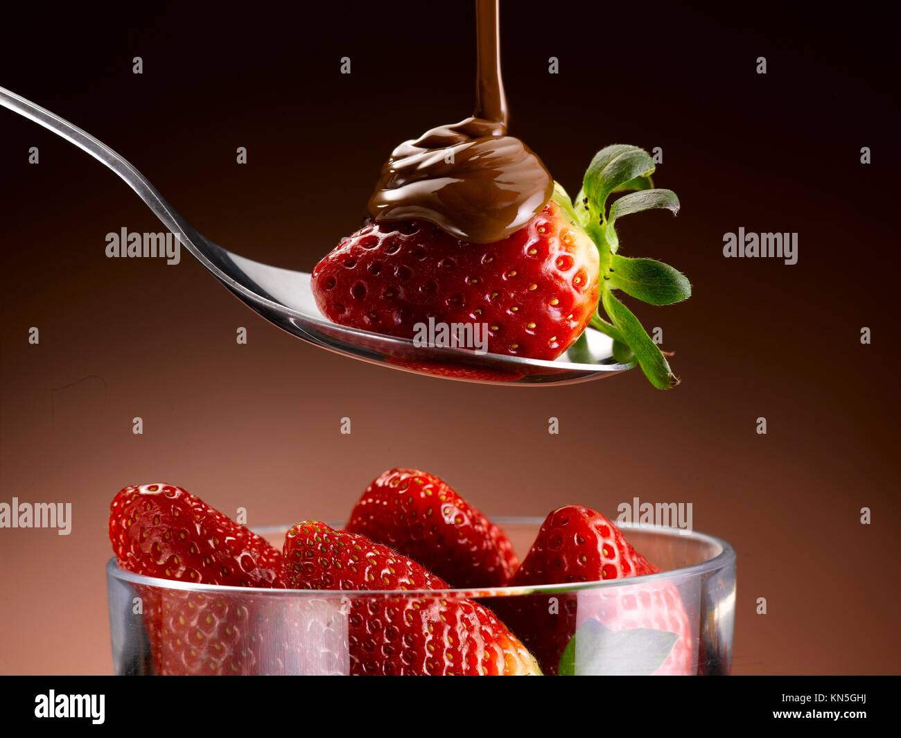 beautiful strawberries wrapped in chocolate Stock Photo - Alamy