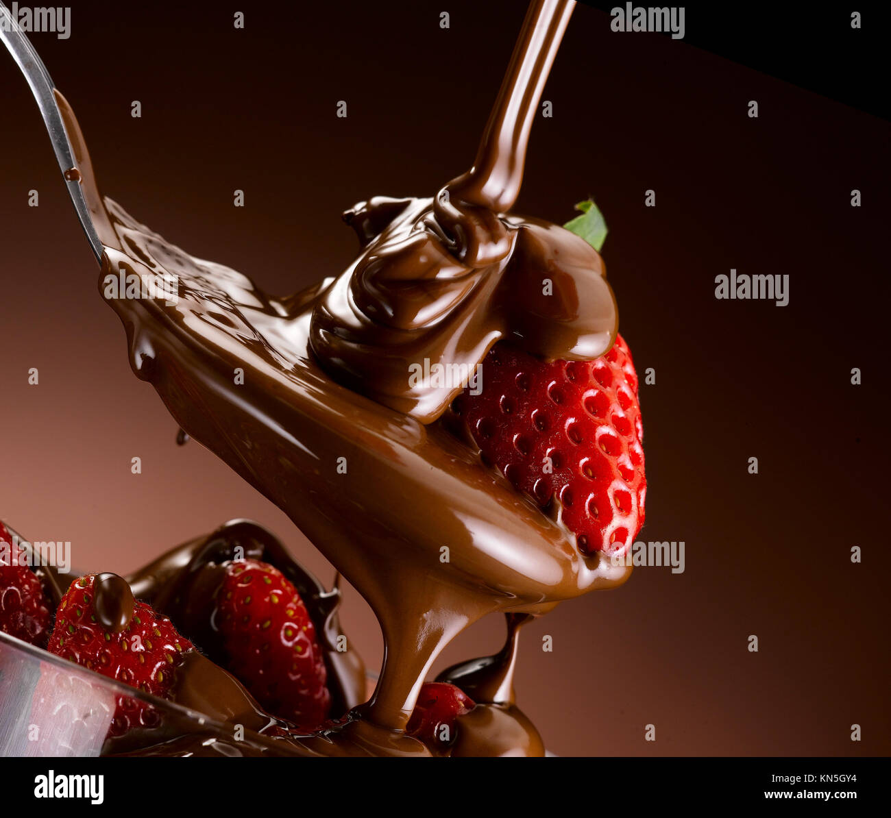 beautiful strawberries wrapped in chocolate Stock Photo - Alamy