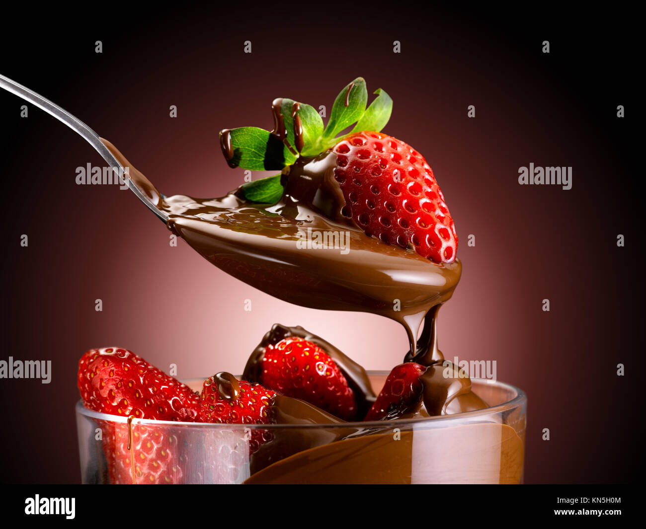 beautiful strawberries wrapped in chocolate Stock Photo - Alamy