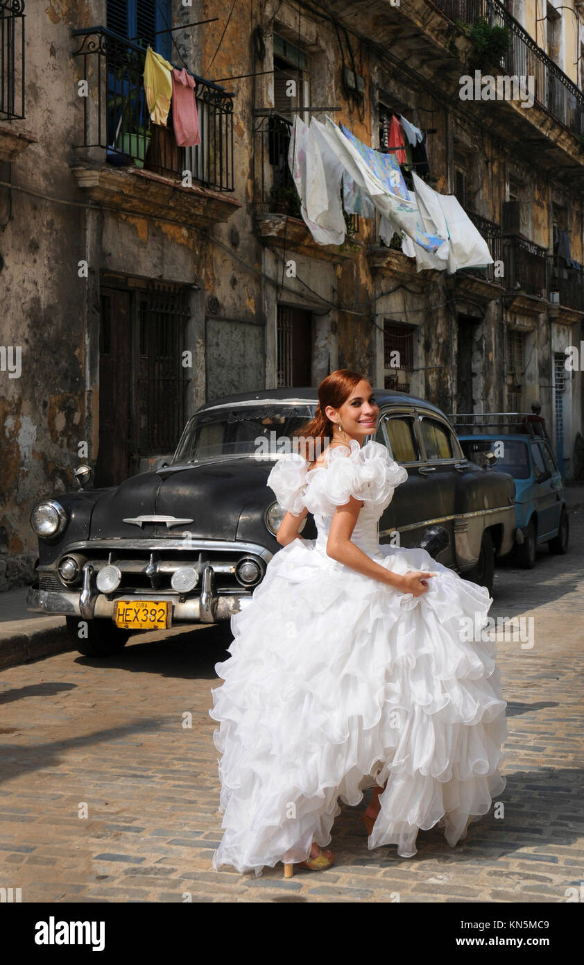 Young Cuban girl walks past a street in Havana, Cuba Stock Photo - Alamy