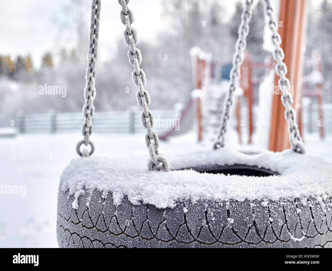 Close up, snowy playground in December, frost and cold weather Stock ...