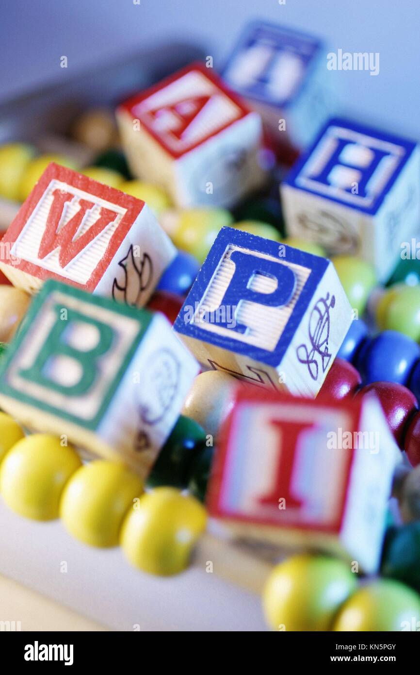 Alphabet cubes and counting beads Stock Photo - Alamy