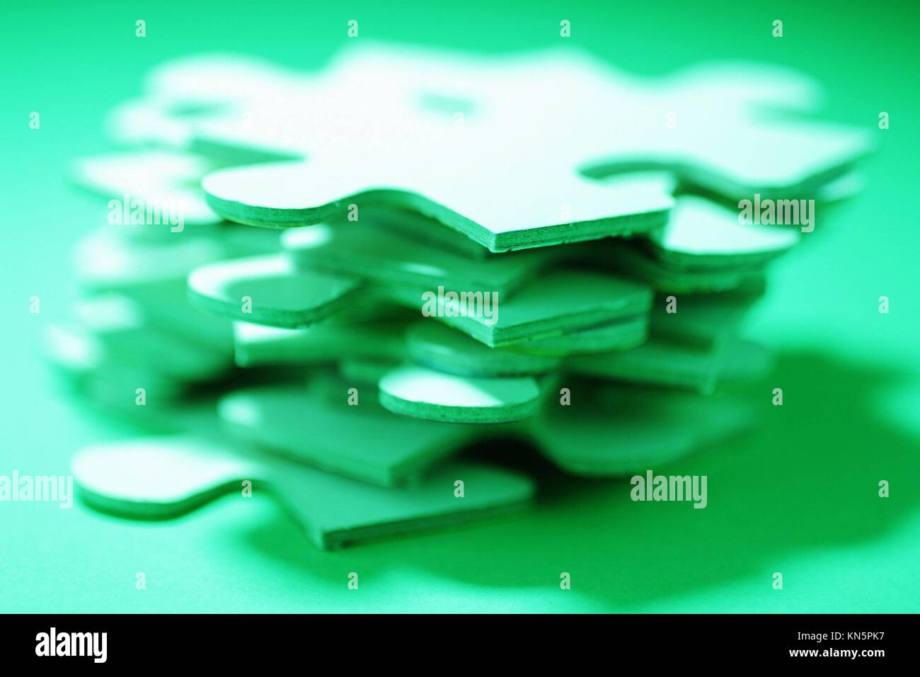 Stacked puzzle pieces hi-res stock photography and images - Alamy