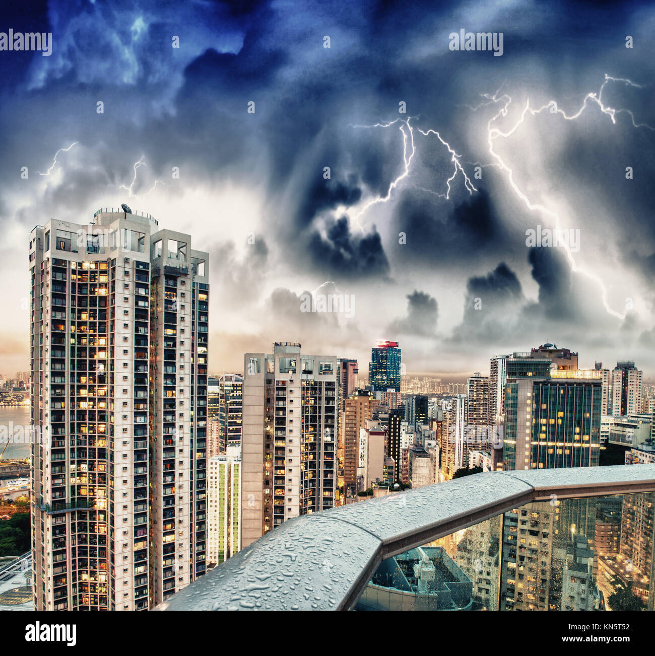 Bad weather over city skyscrapers on a modern city Stock Photo - Alamy
