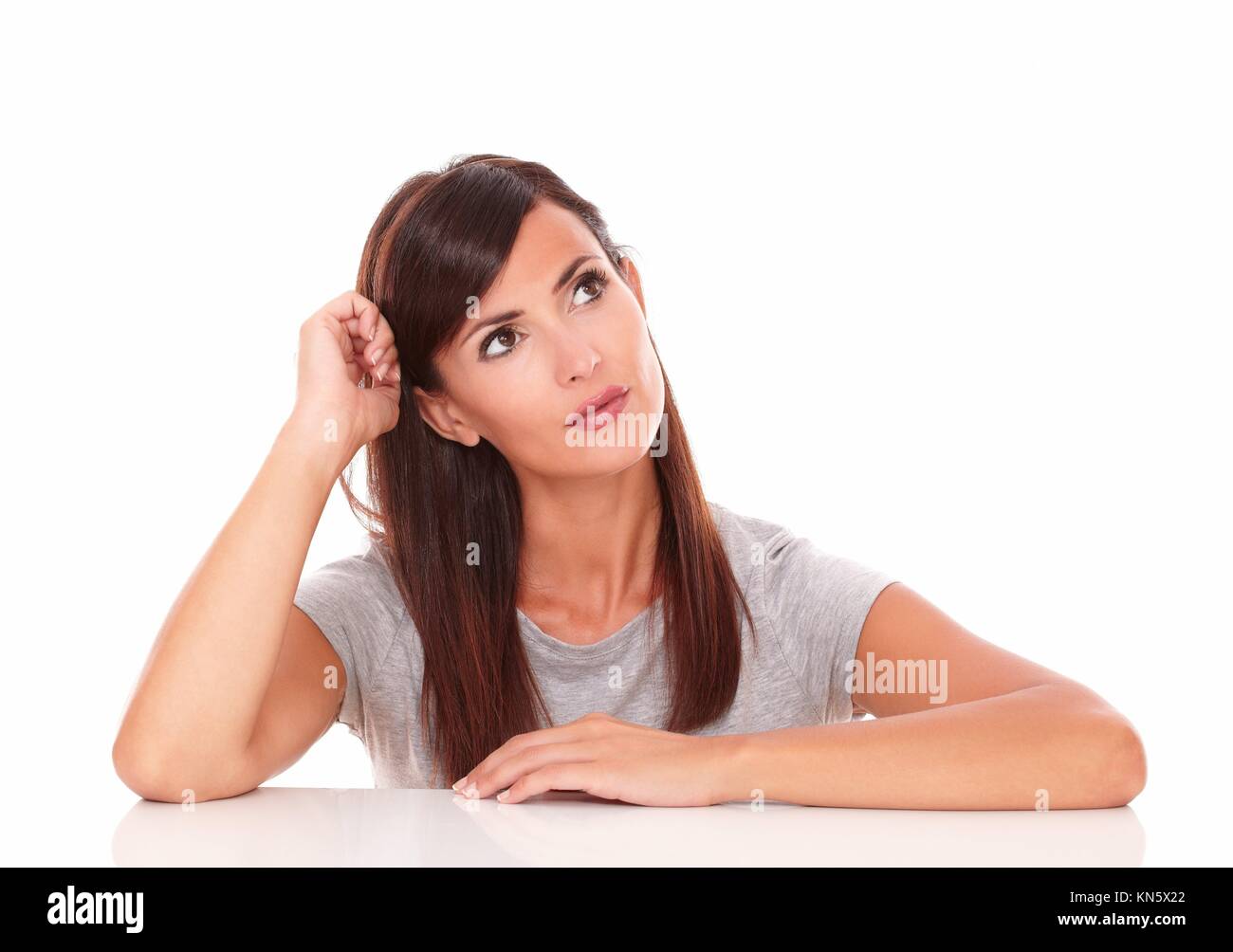 Portrait of interested lovely woman asking a question while looking to ...