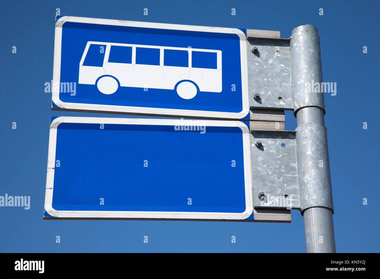 Blue Bus Sign against Sky Background Stock Photo - Alamy