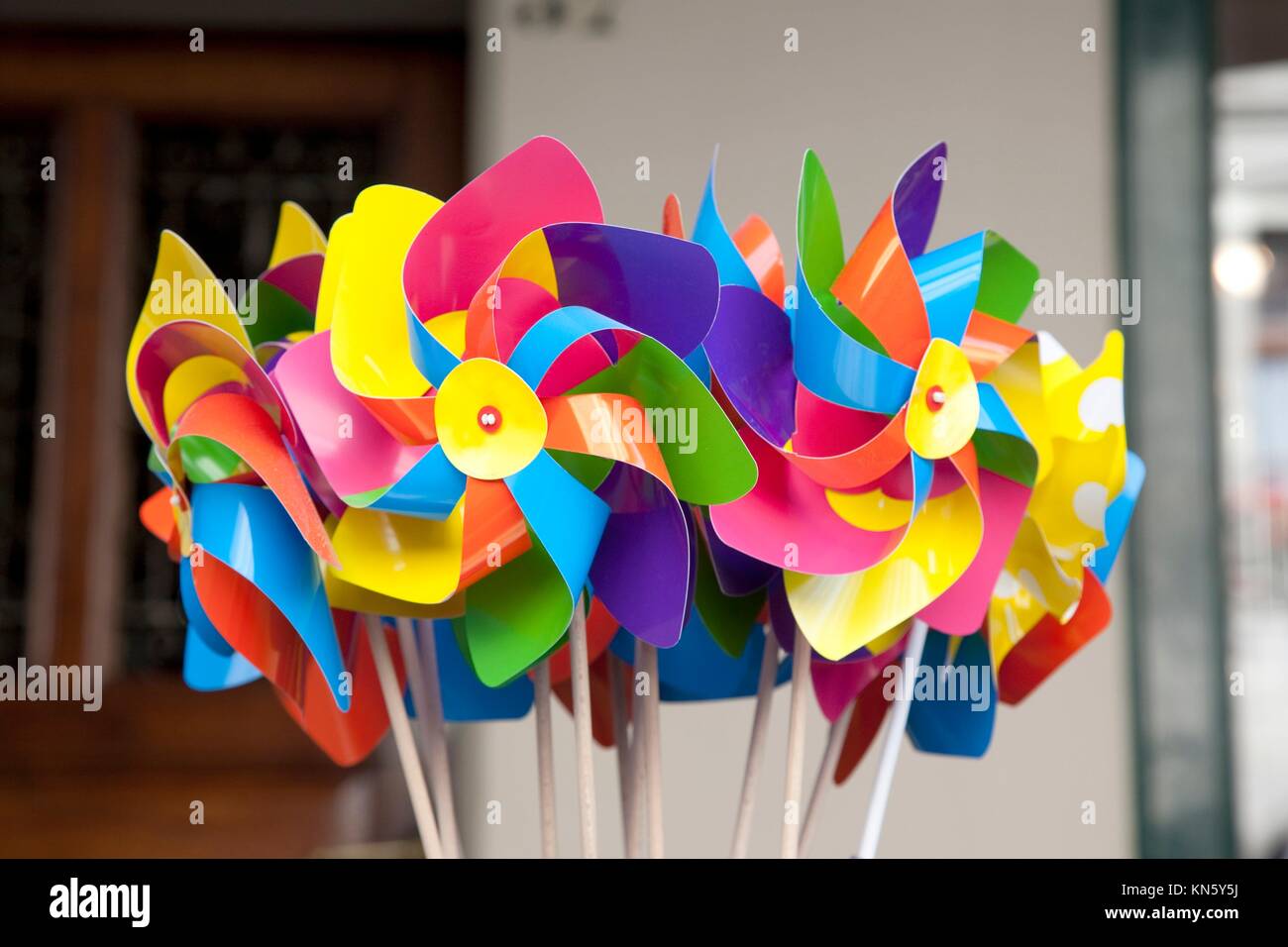 Toy Windmills outside Shop Stock Photo - Alamy