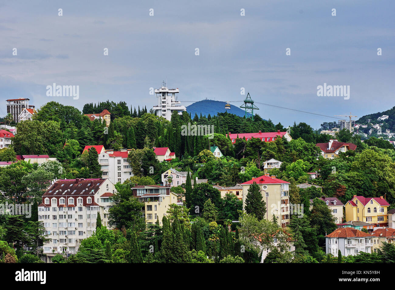 Panorama of Sochi from the air. Houses, streets, trees, the sky are ...