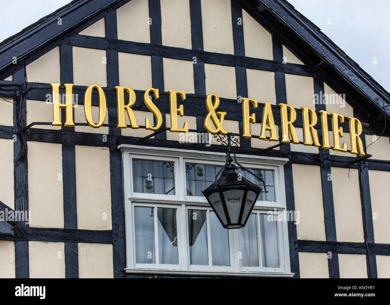 Horse & Farrier sign on the end of the mock tudor public house. This is ...