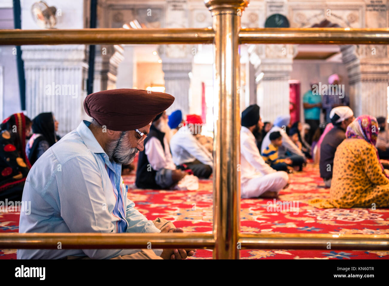 Sikh praying in gurdwara sisganj hi-res stock photography and images - Alamy