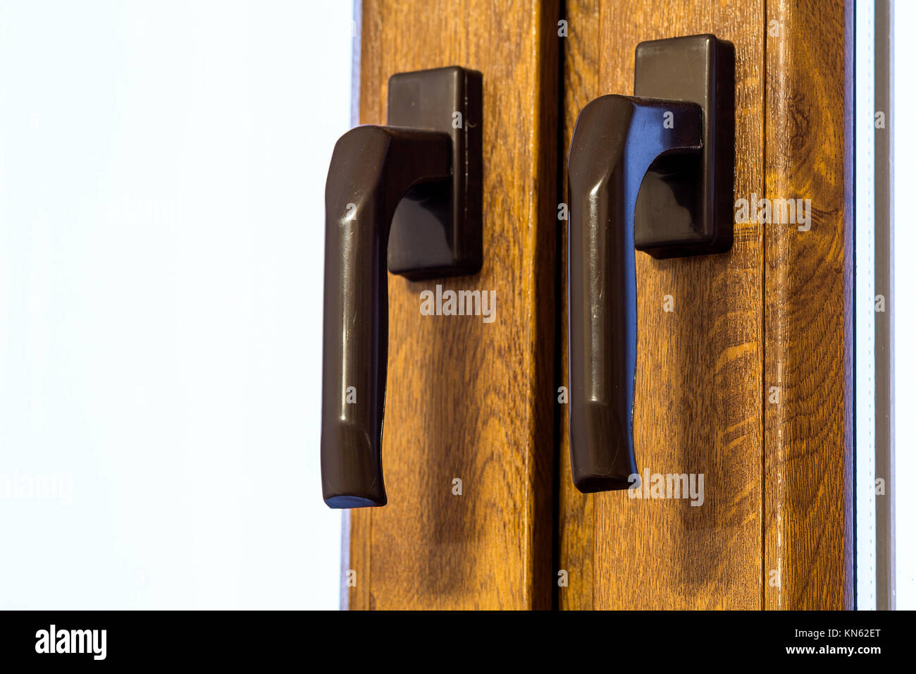 Wooden modern window handle. Home interior detail Stock Photo - Alamy