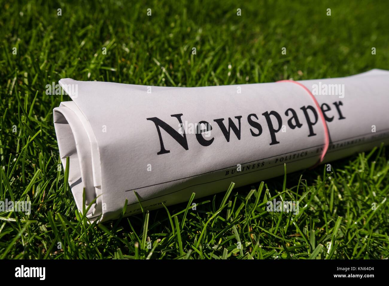 Newspaper Rolled Stock Photos & Newspaper Rolled Stock Images - Alamy