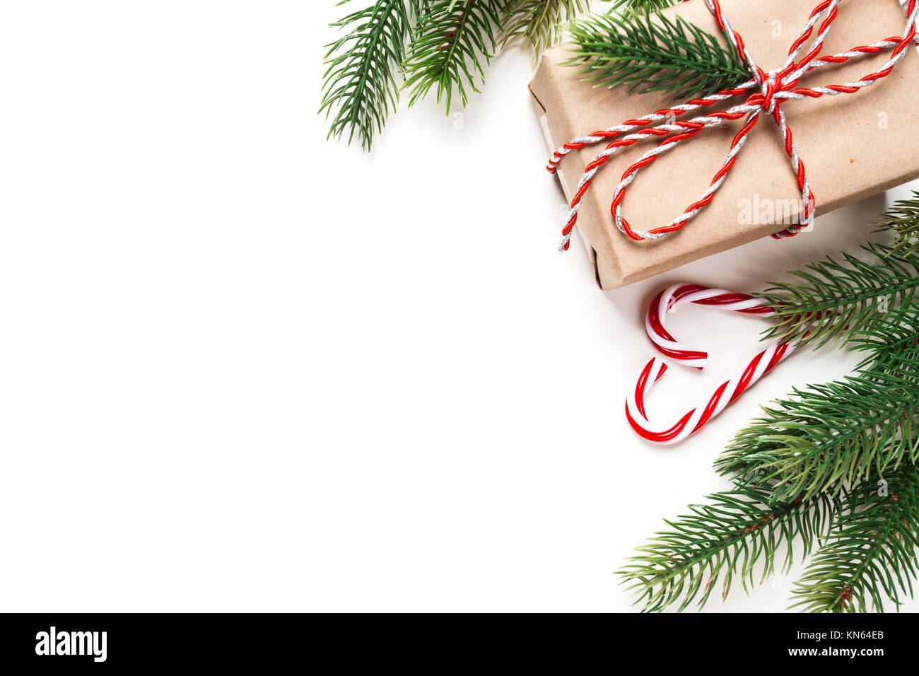 Christmas present and candy on the white table Stock Photo - Alamy