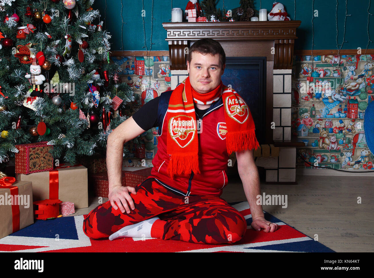 fan of Arsenal posing in the New Year's environment.Isolated portrait ...