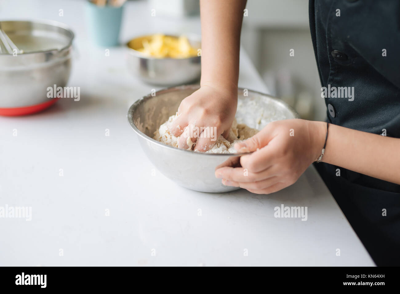 Bakery chef cooking bake in the kitchen professional Stock Photo - Alamy