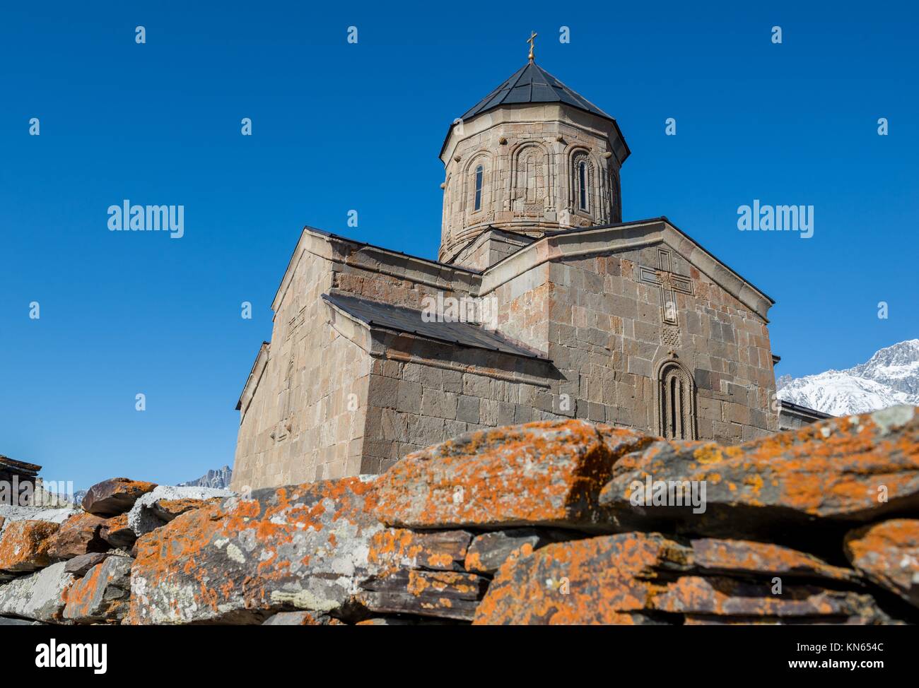 14th century Holy Trinity Church (Tsminda Sameba) near Mount Kazbek in ...