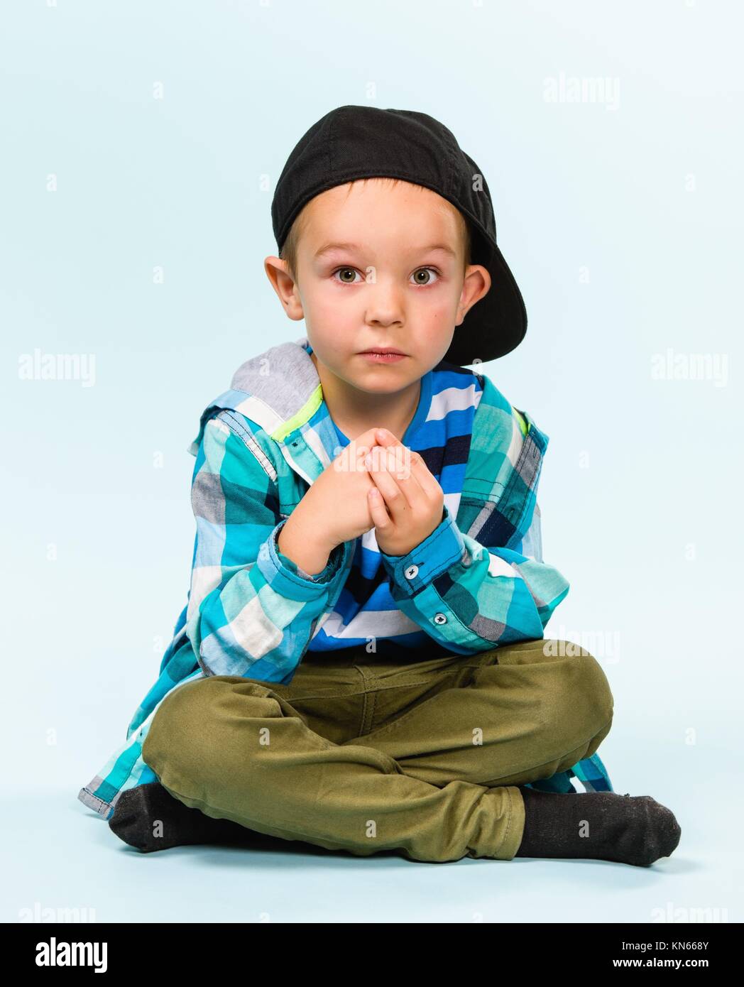 Young kid wearing cap hi-res stock photography and images - Alamy