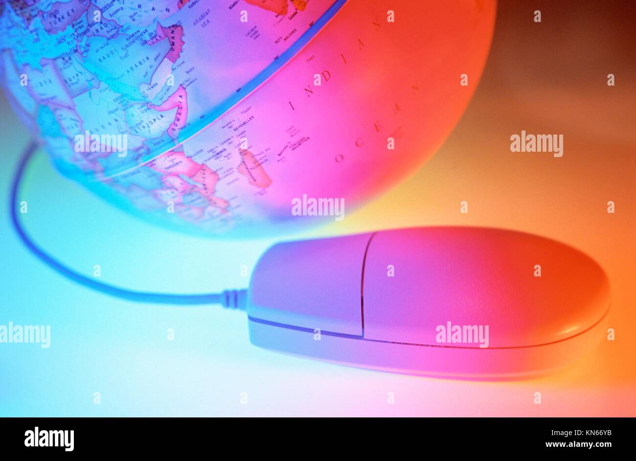 Computer mouse and globe Stock Photo - Alamy