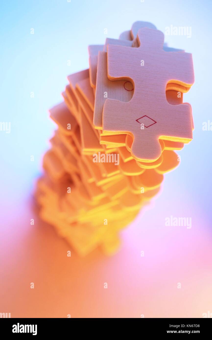 Stacked puzzle pieces hi-res stock photography and images - Alamy