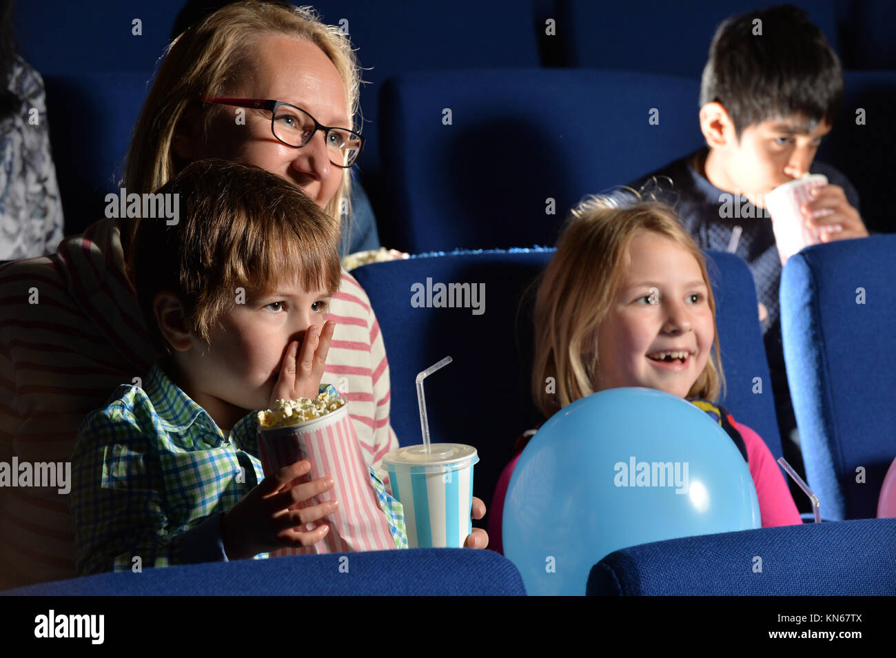 Families enjoying a matinee performance in the cinema at the Warwick ...