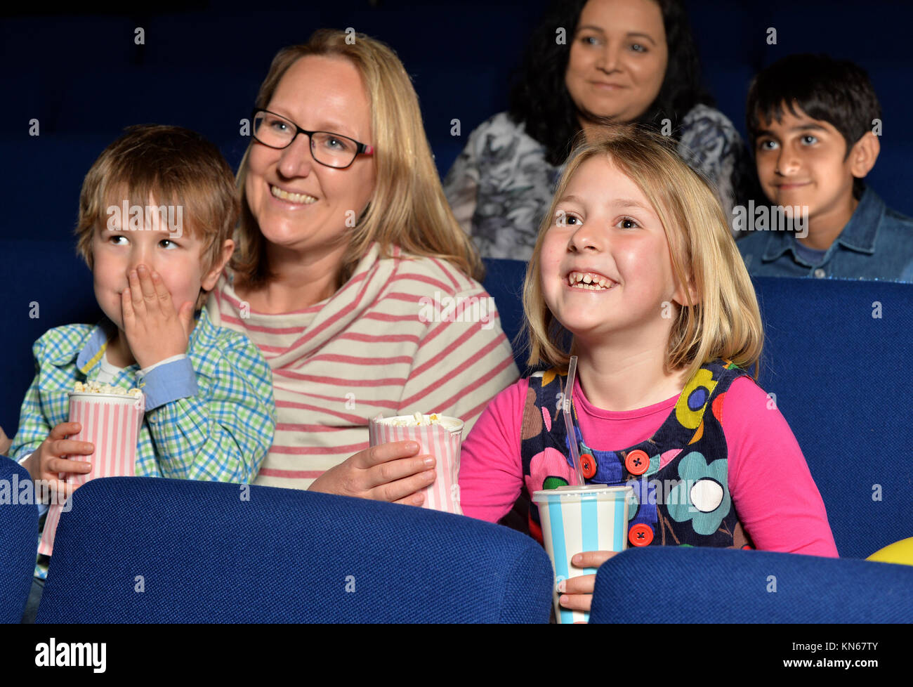 Families enjoying a matinee performance in the cinema at the Warwick ...