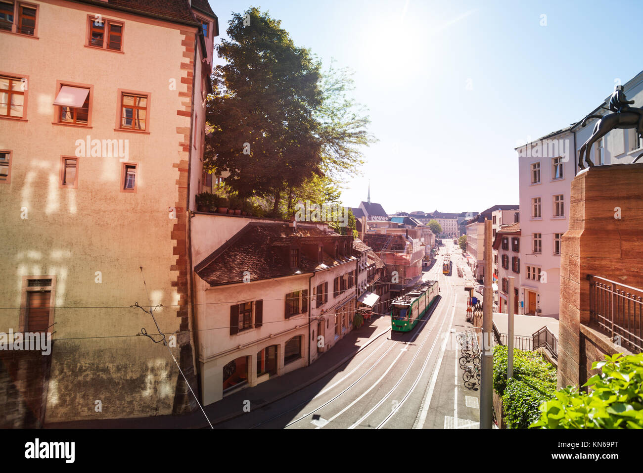 Top view picture of city tram on the ancient street of Basel in summer ...