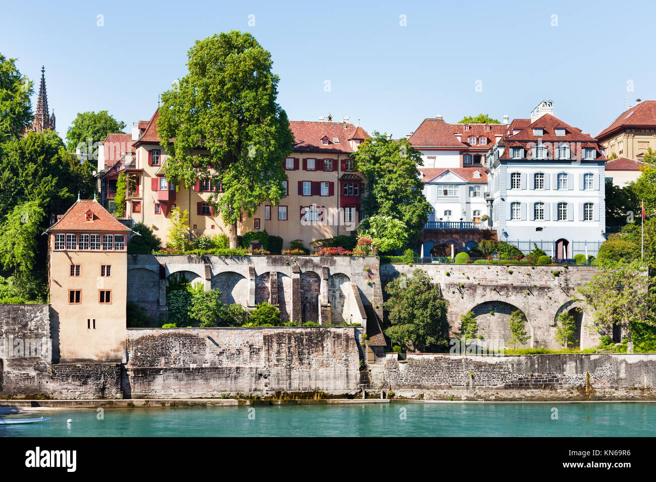 Beautiful view of Basel waterfront with stone fortification and ...