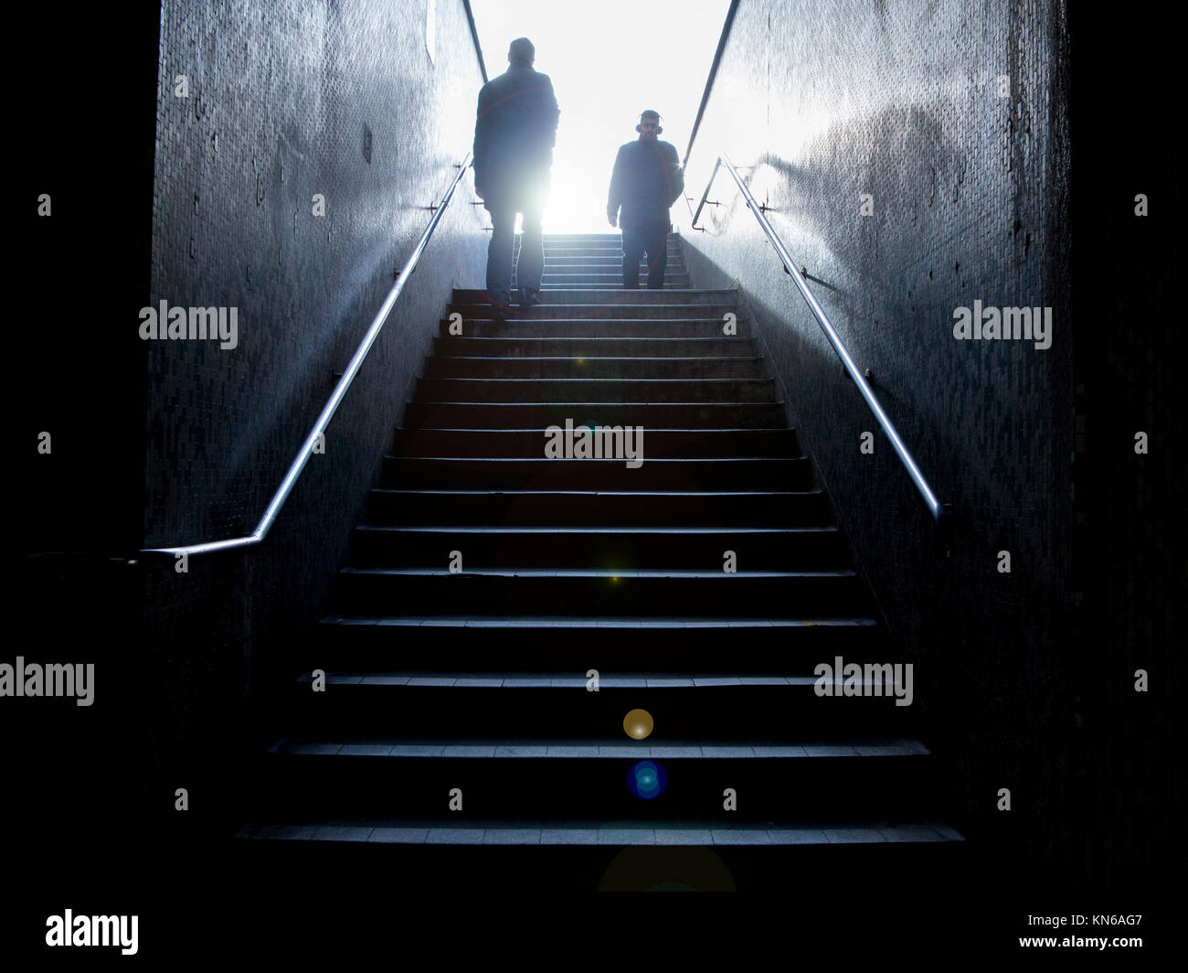 Ascending a staircase from under ground Stock Photo - Alamy