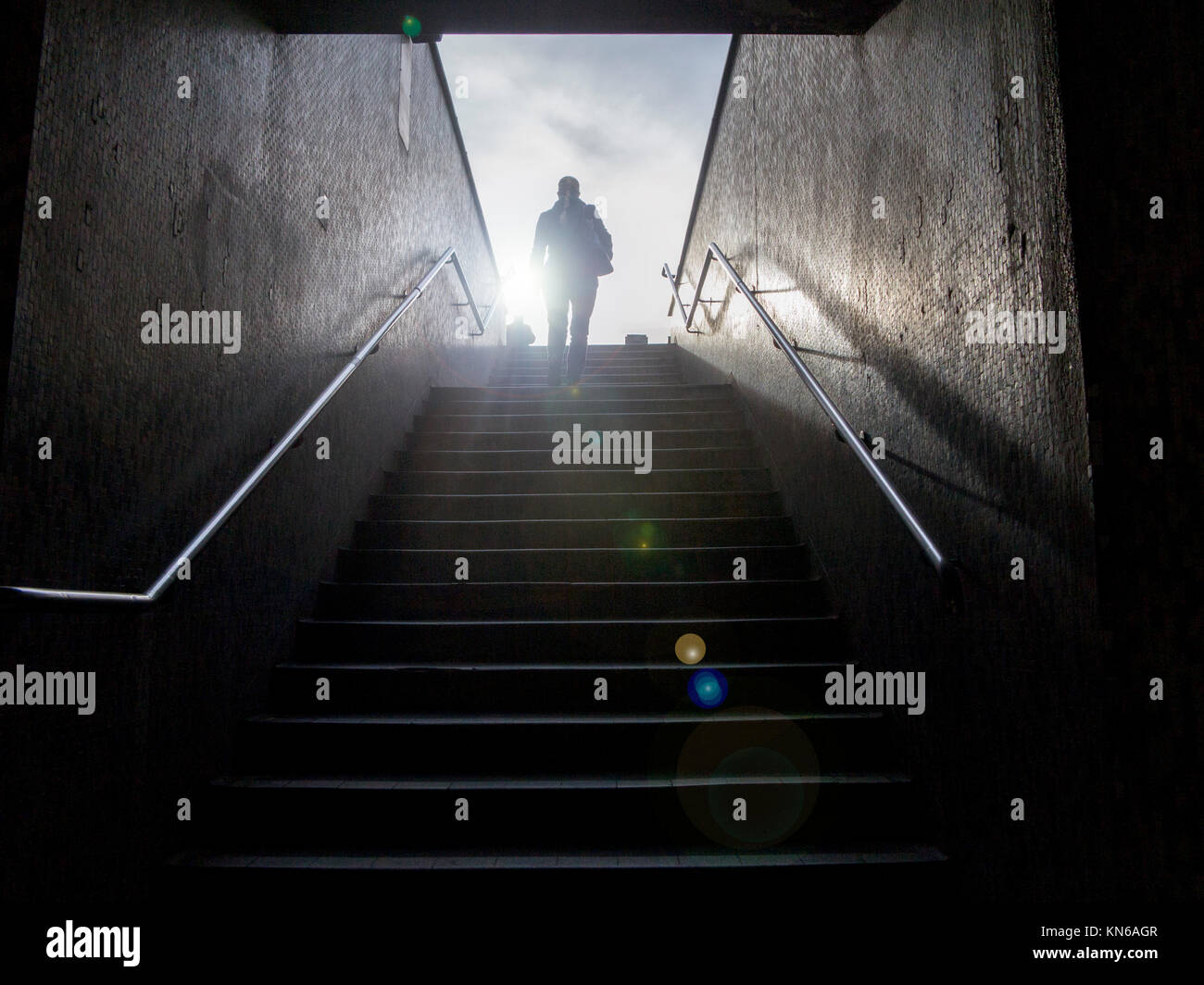 Man men ascending stairs hi-res stock photography and images - Alamy