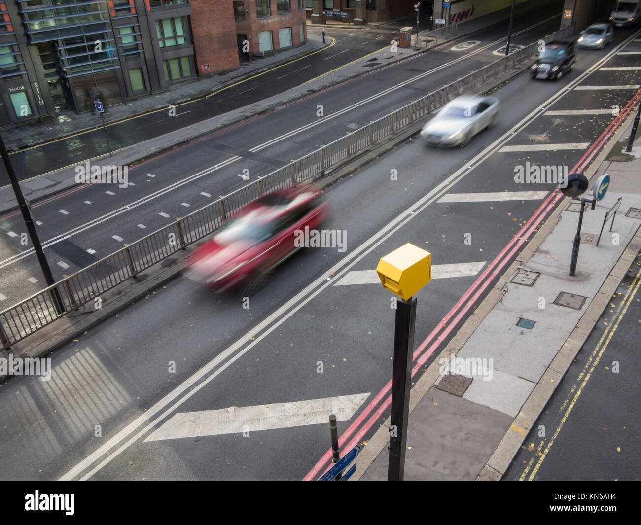 Cars speeding through a speed trap Stock Photo - Alamy