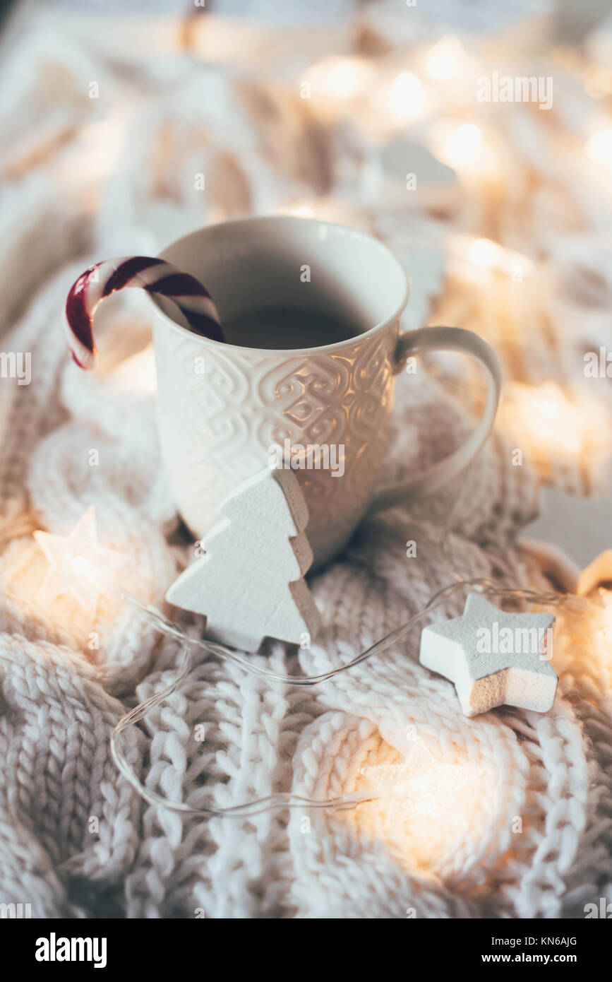 Winter holiday Christmas decorations, white wooden toys, hot dri Stock ...