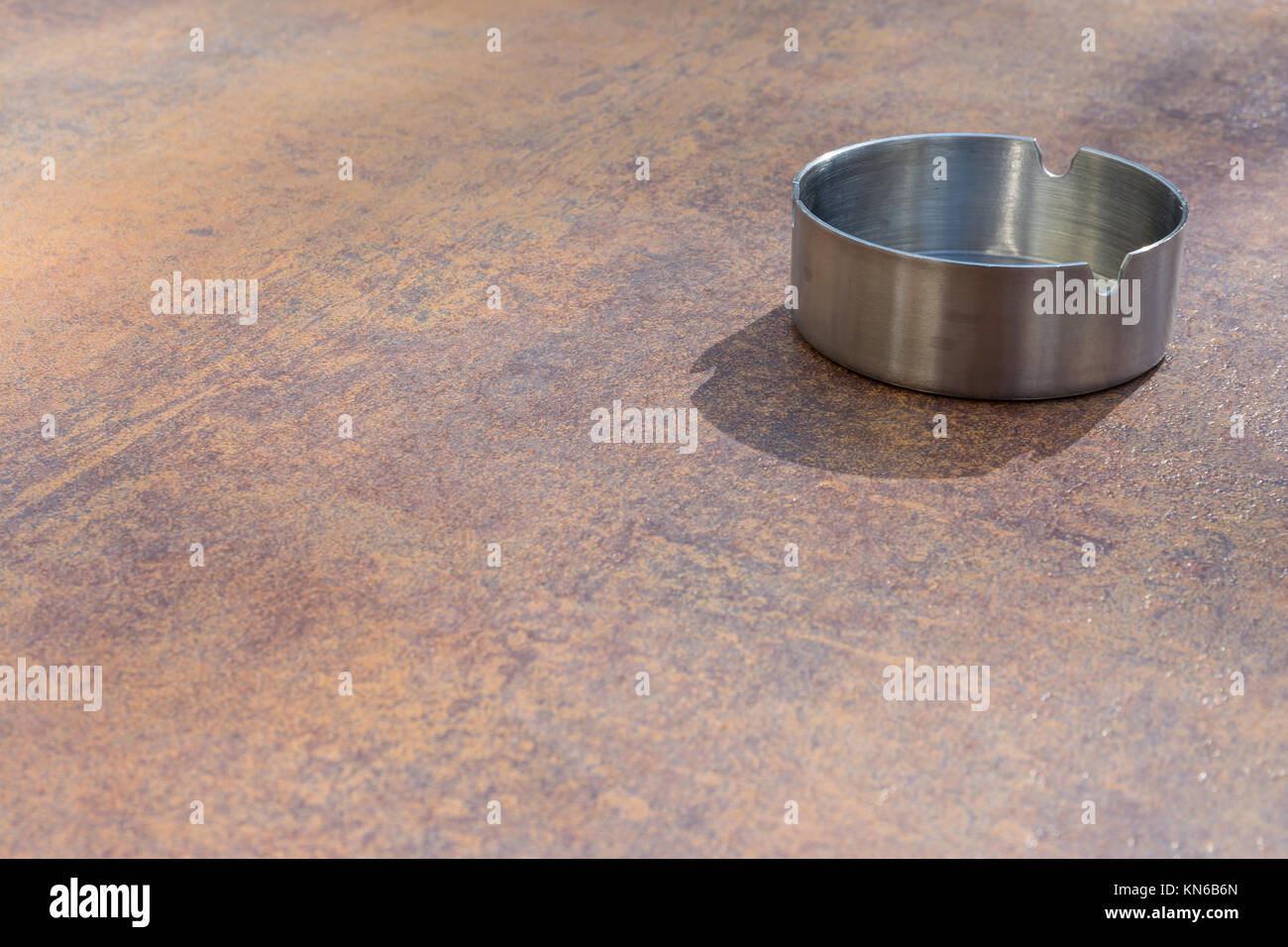 Metal Aluminium Ash Tray on Copper Table Top Texture Background Smoking ...