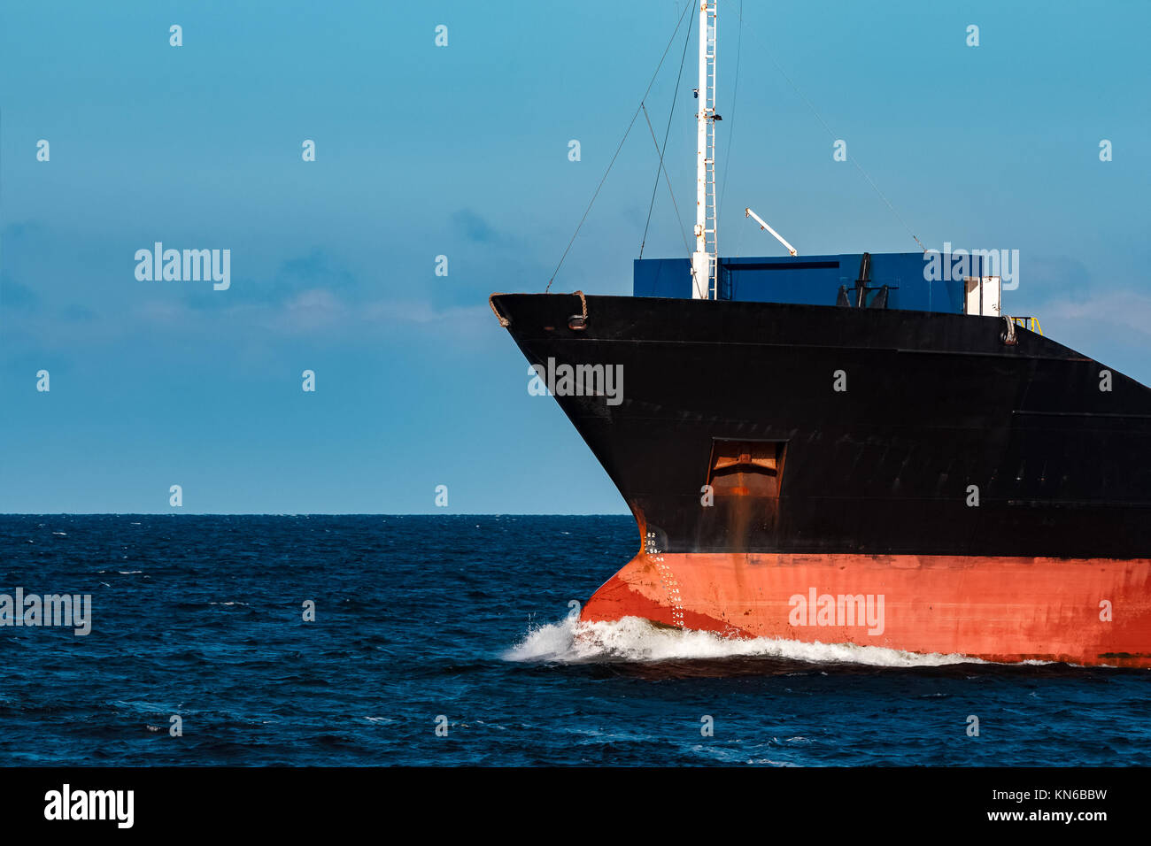 Black bulker ship. Logistics and merchandise transportations Stock ...