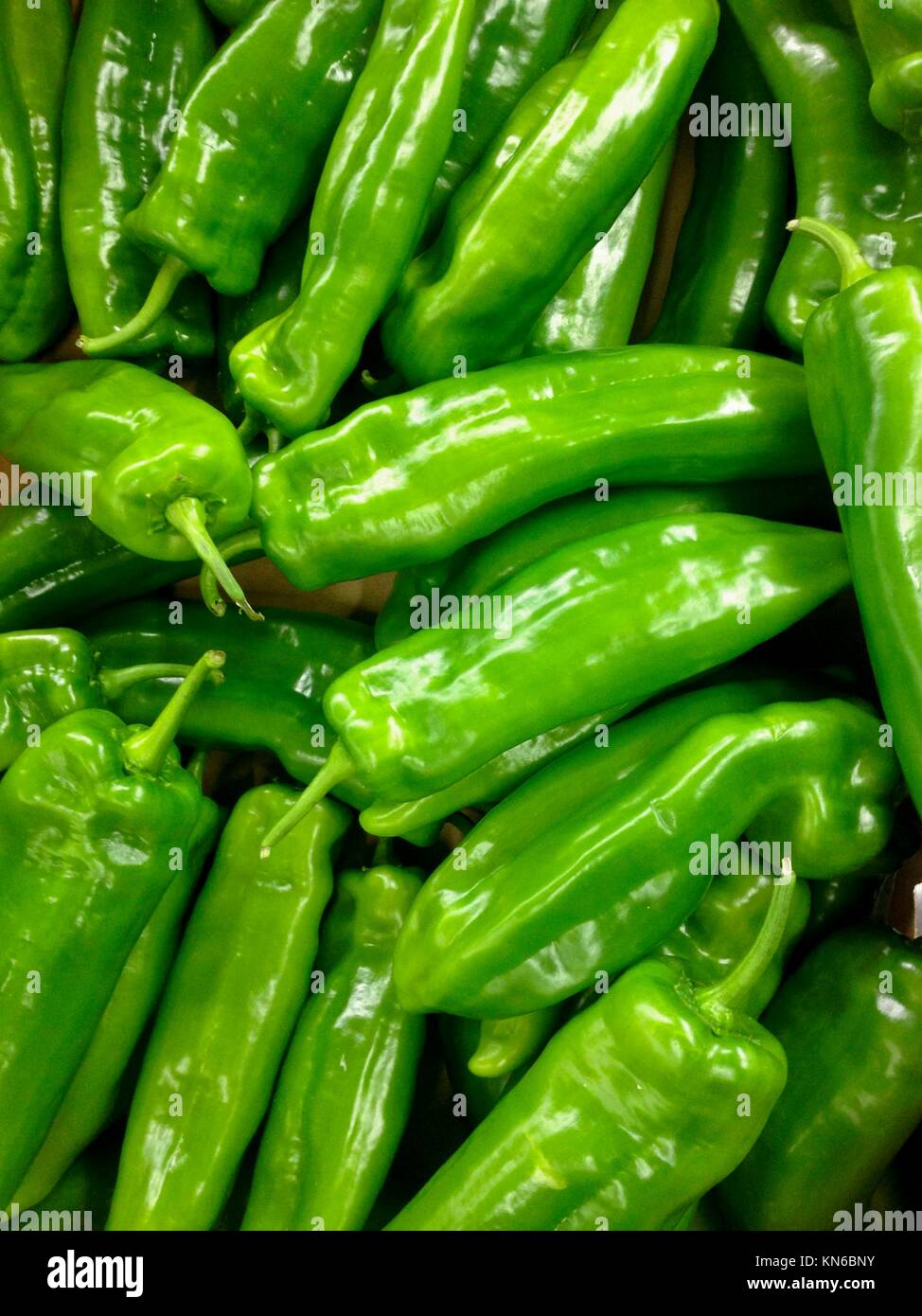 Box of green italian peppers on supermarket Stock Photo - Alamy
