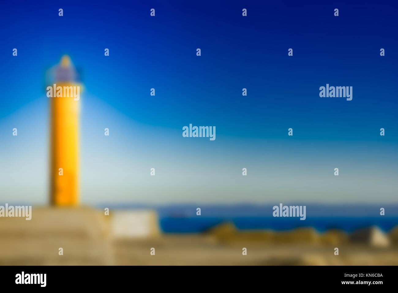 Yellow lighthouse - soft lens bokeh image. Defocused background Stock ...