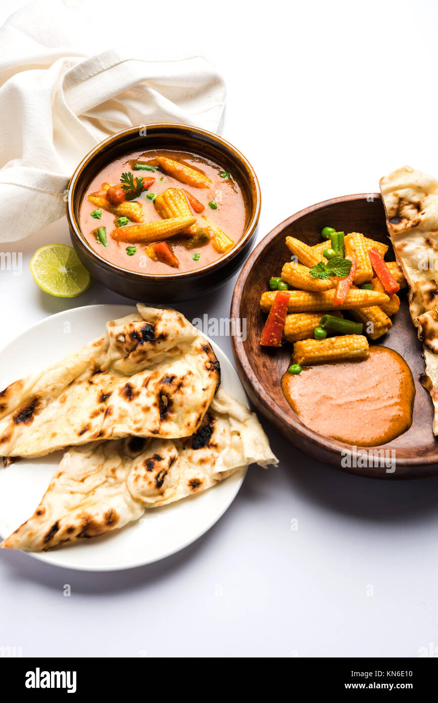 Indian Baby Corn Masala or spicy Baby corn curry served with roti or ...