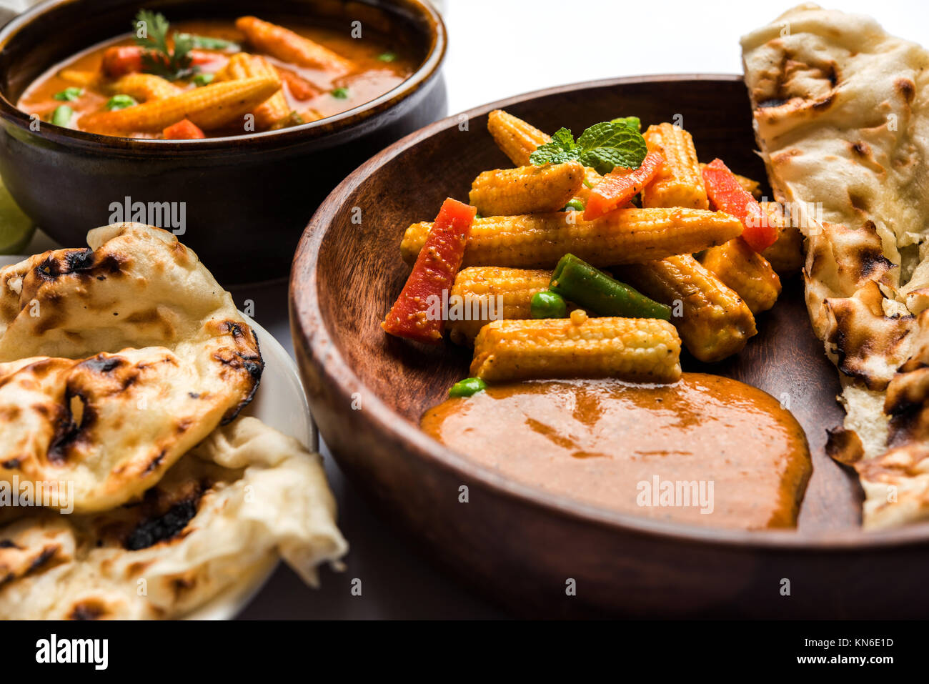 Indian Baby Corn Masala or spicy Baby corn curry served with roti or ...