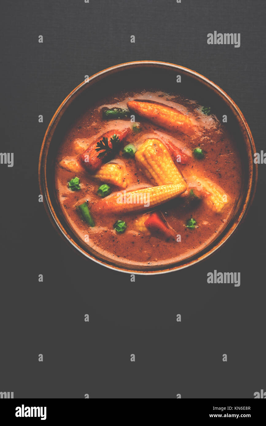 Indian Baby Corn Masala or spicy Baby corn curry served with roti or ...