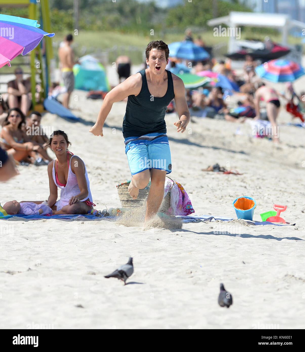 MIAMI BEACH, FL - MAY 08: Actors Ana de Armas and Miles Teller film on ...