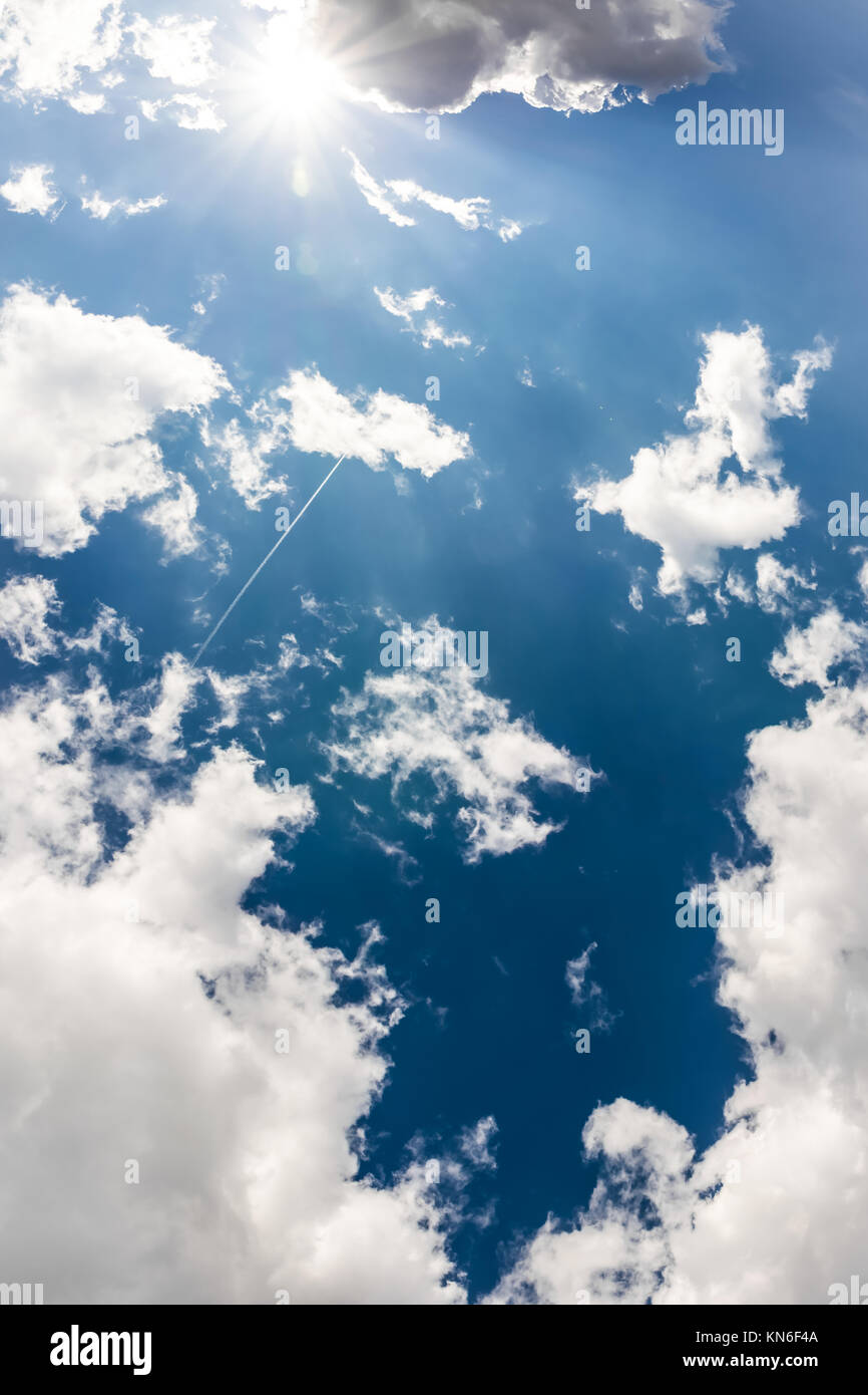 White Clouds Blue Sky Fluffy Sun Flare Airplane Trail Sunny Daytime ...
