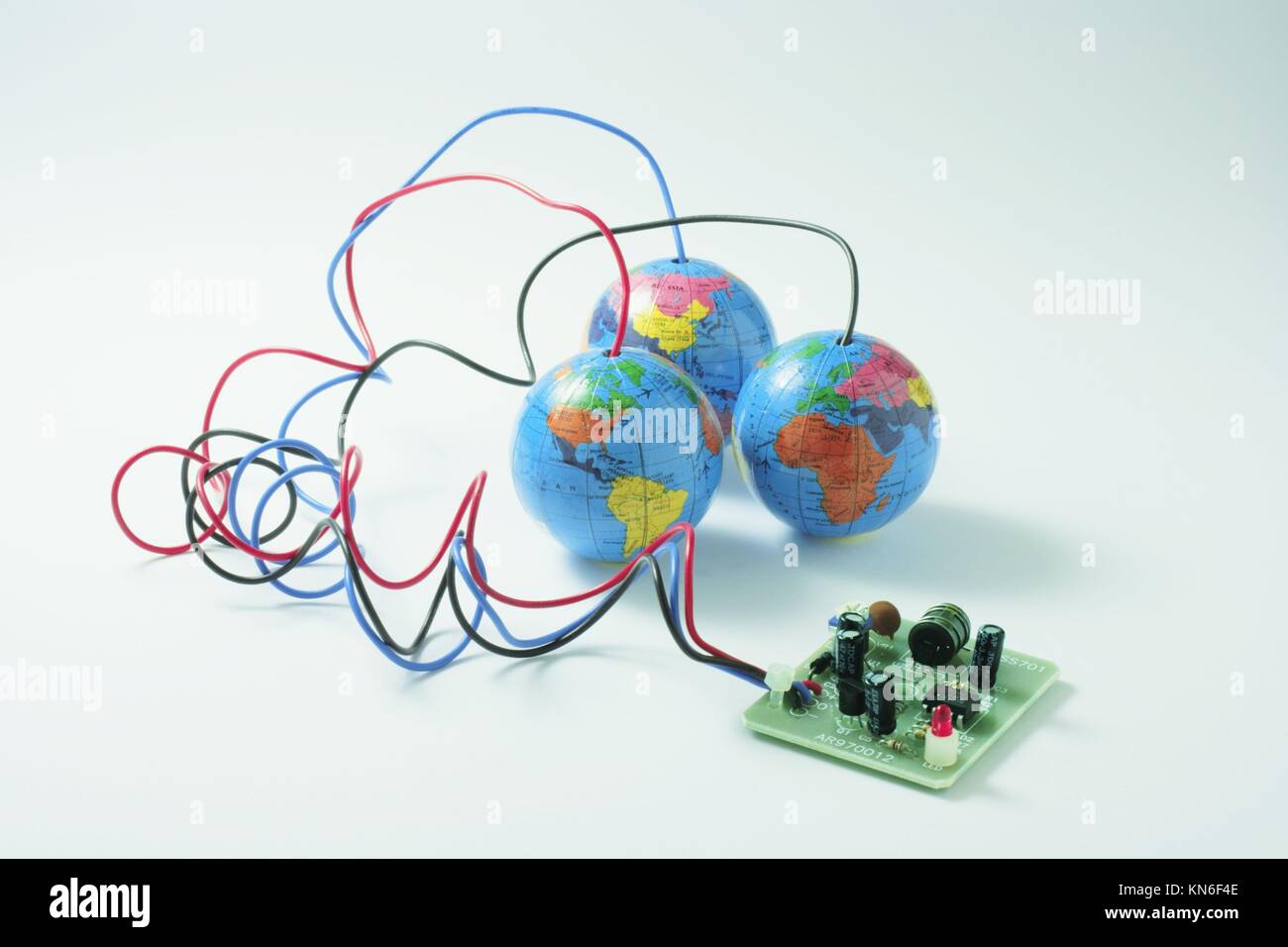 Globes and Circuit Board Stock Photo - Alamy