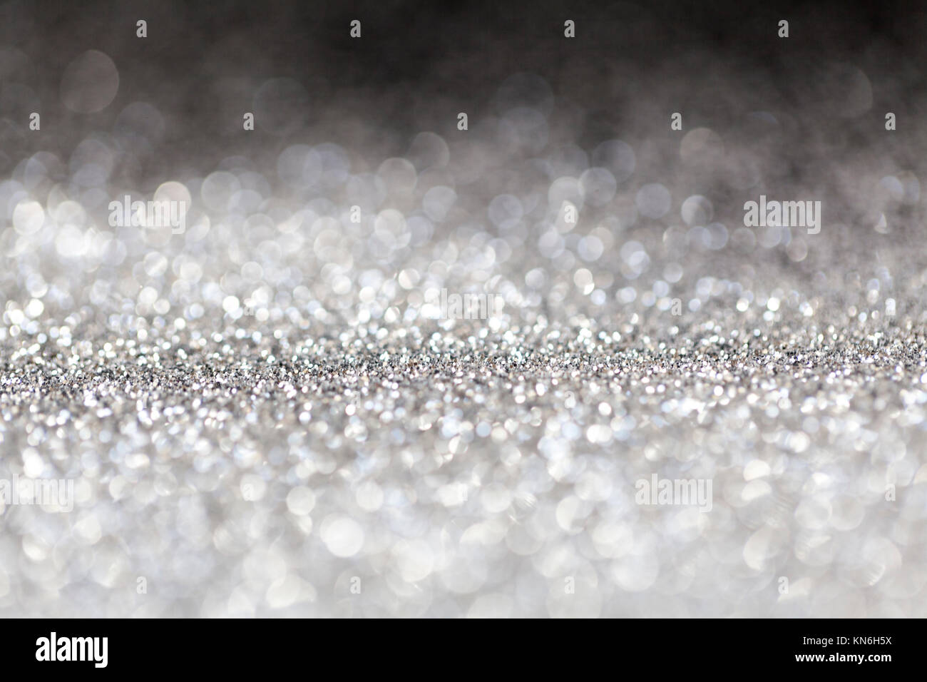silver sparkles blur, close up Stock Photo - Alamy